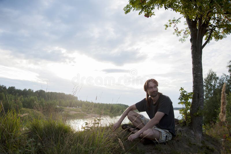 Man on the shore of lake stock photo. Image of vacations - 42191270