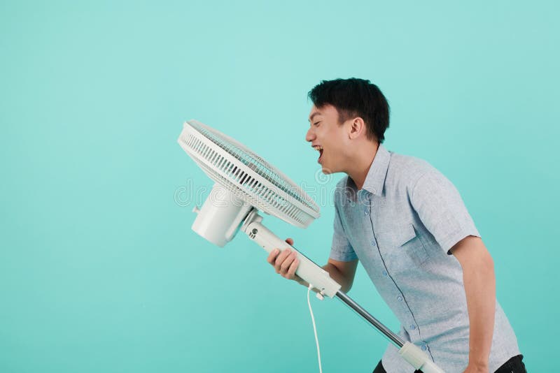 Man Shouting in Fan As Microphone Stock Image - Image of sing, joke ...