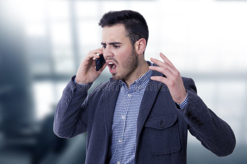 Man shouting by the phone stock photo. Image of hipster - 94702740