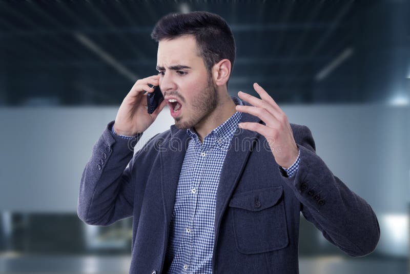 Man shouting by the phone stock photo. Image of formal - 94707980
