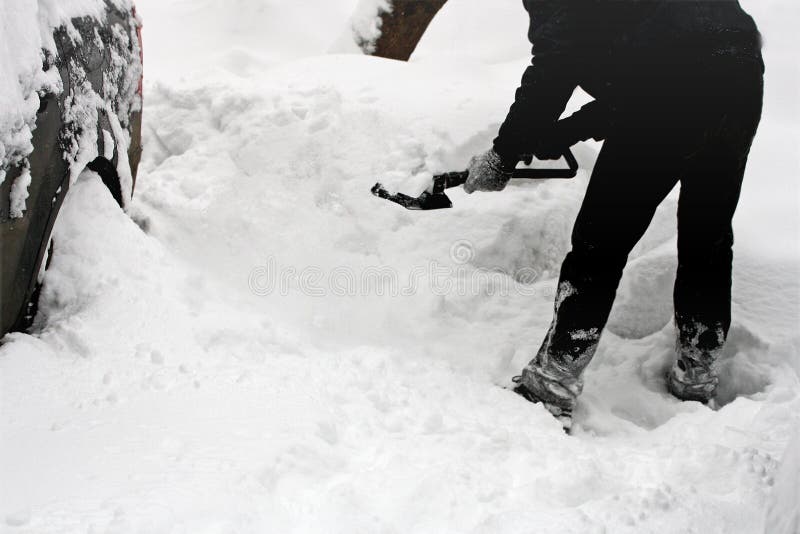 Digging out of a Blizzard. stock image. Image of deep - 9297597