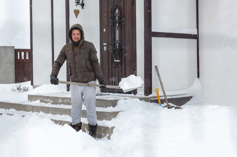 Man Shoveling Snow from the Steps of His House Stock Photo - Image of ...