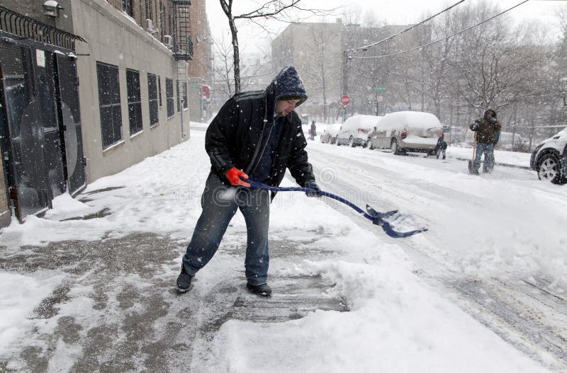 Man Shoveling Snow During Snow Storm Editorial Photography - Image of ...