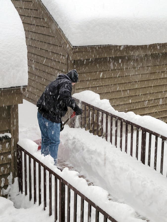 Man Shoveling Snow on Walkway Stock Image - Image of cold, shovel ...