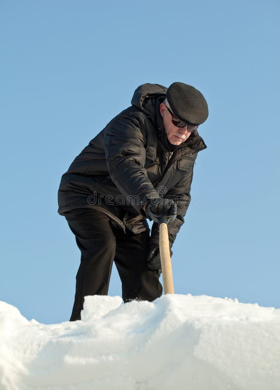 Man shovelling snow stock photo. Image of caucasian, frost - 25445576