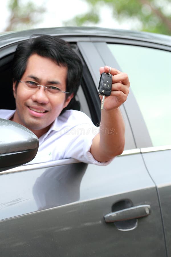 Man show car key stock photo. Image of business, positive - 23936266