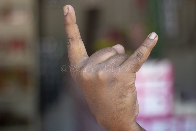 A Man Show His Own Hand Style and the Background is Blurred Stock Image ...