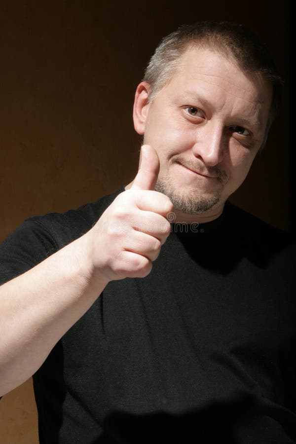 Businessman with Thumb Up stock photo. Image of office - 219148