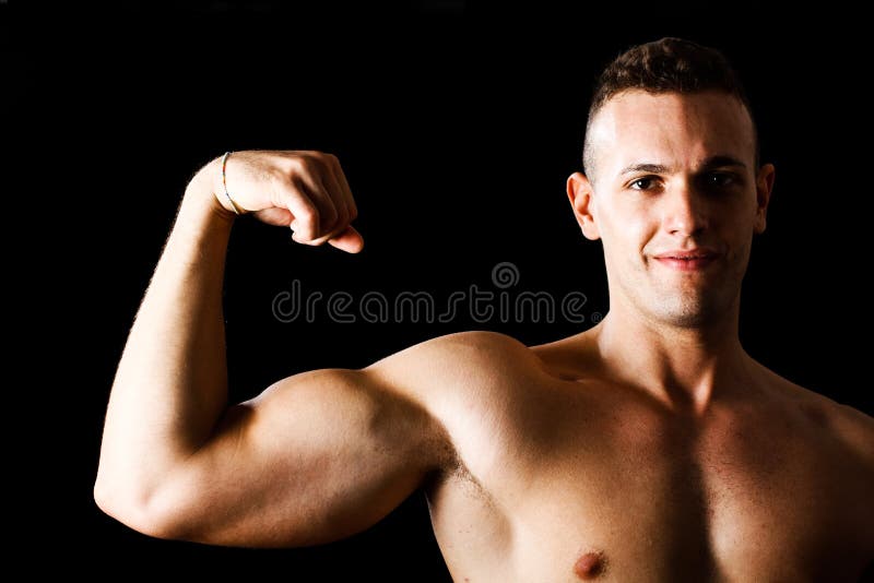 Man showing biceps stock photo. Image of smiling, biceps - 22637324