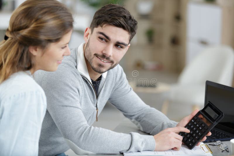 Man Showing Budget and Expense from Number Calculator Stock Image ...