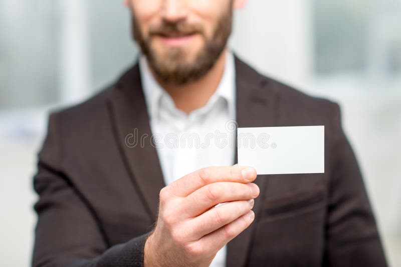 Man showing business card stock image. Image of holding - 85197991