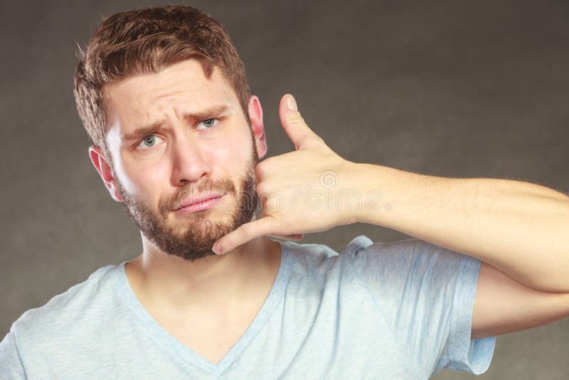 Man Showing Call Me Gesture. Stock Photo - Image of sign, looking: 67982936