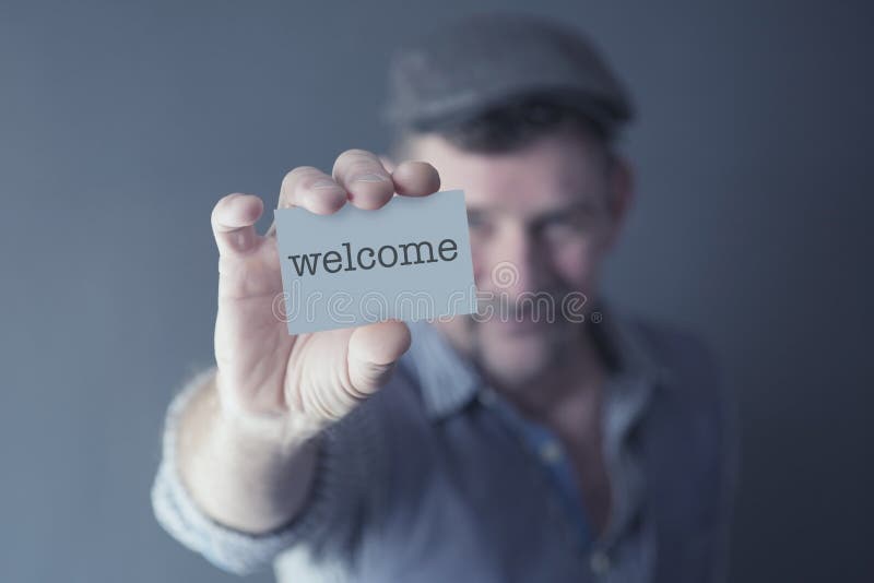 Man Showing a Card with the Word Welcome Stock Image - Image of ...