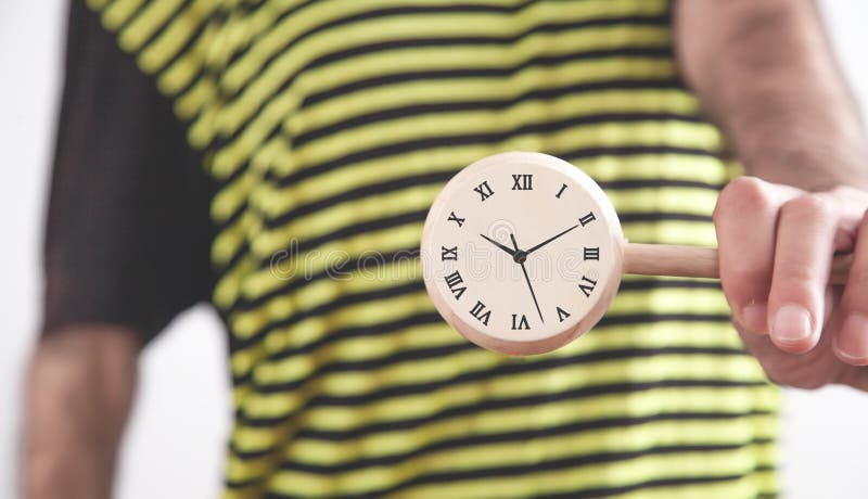 Man Showing Clock on Wooden Round. Time Management Stock Image - Image ...