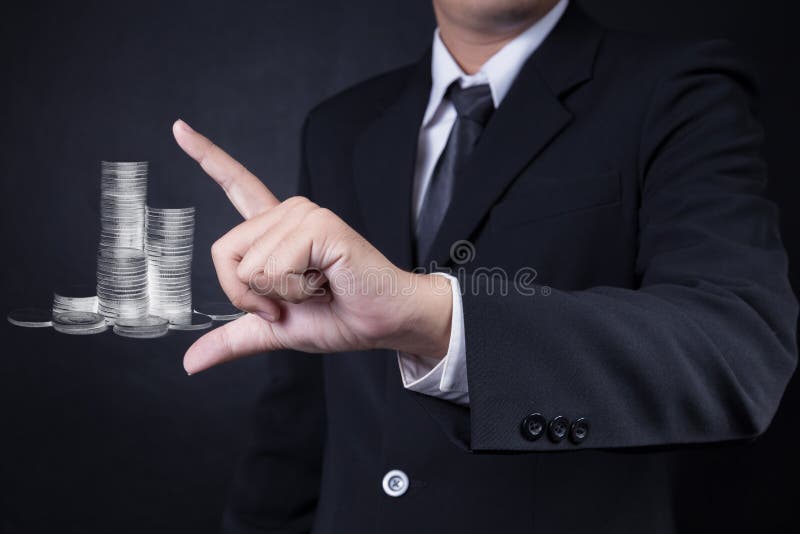 Man showing coin stack stock photo. Image of silver, coin - 95879250