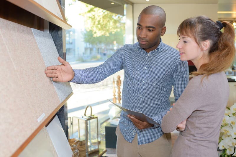 Man Showing Display Tiles To Customer Stock Photo - Image of brochure ...