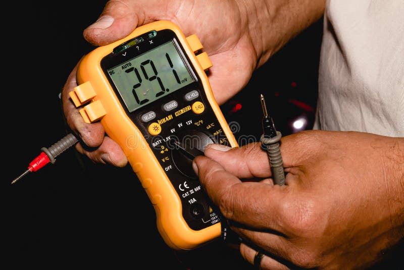 Man showing a multimeter. editorial stock photo. Image of person ...