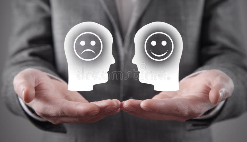 Man Showing Human Head with a Sad and Happy Smiling Face Stock Photo ...