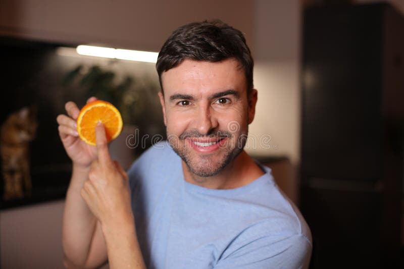 Man Showing the Interior of a Fruit Stock Image - Image of intimate ...
