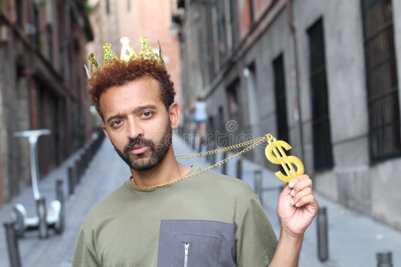 Man showing off his status stock photo. Image of culture - 121637376