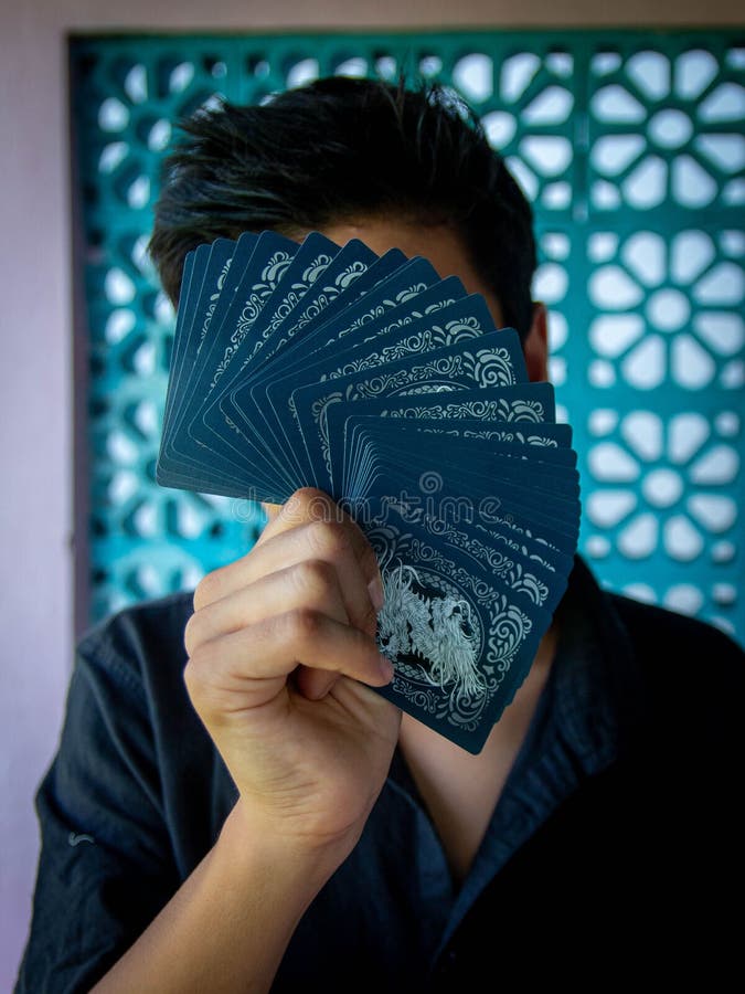 Man Showing a Playing-card Trick Stock Photo - Image of hands, tricks ...
