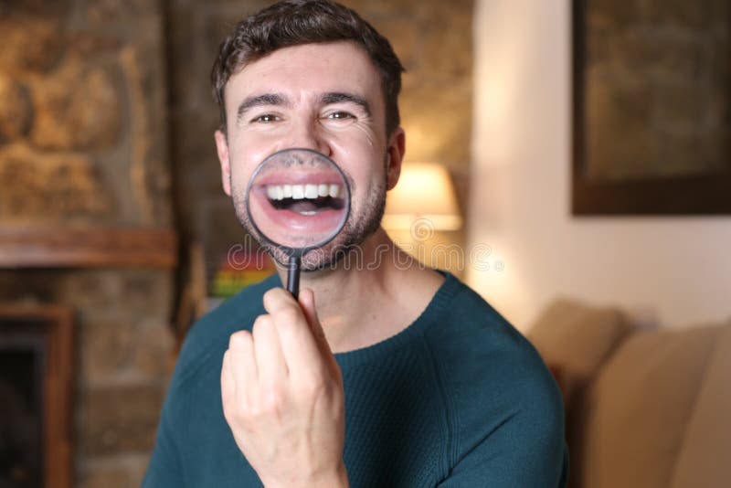 Man Showing the Results of a Teeth Whitening Treatment Stock Photo ...