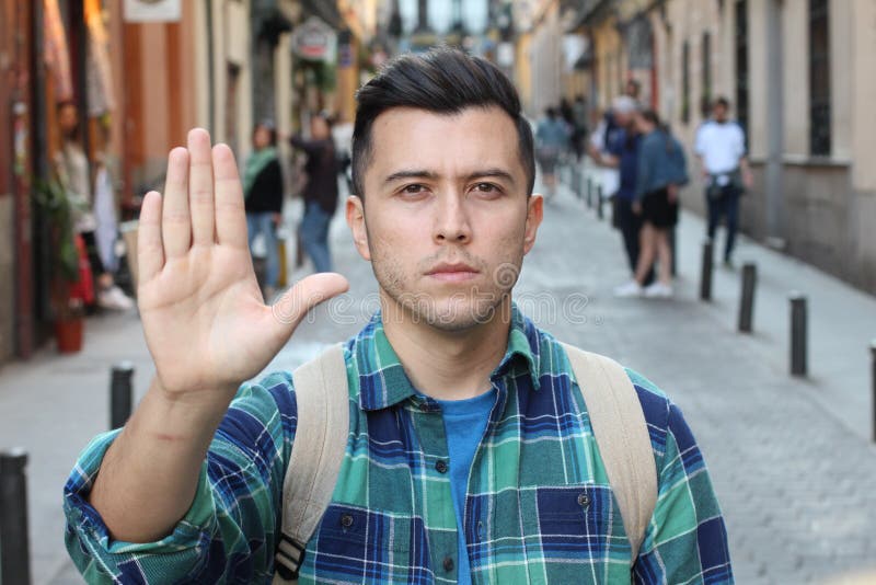 Man Showing Stop Sign Outdoors Stock Image - Image of male, asian ...