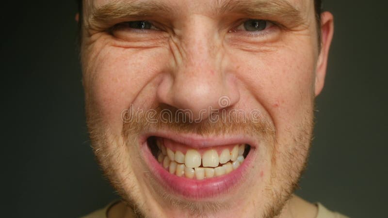 Man Showing Teeth Baring in Different Expressions Stock Footage - Video ...