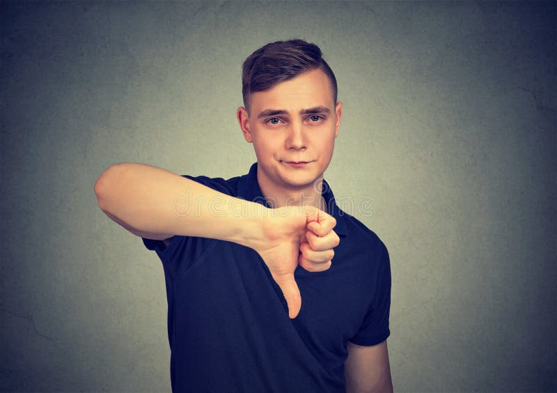 Man Showing Thumb Down Hand Gesture Stock Photo - Image of casual ...