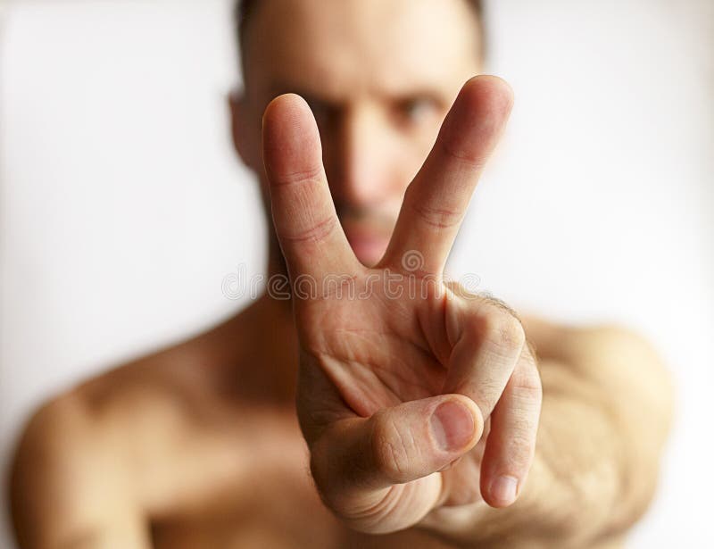Man showing two fingers stock image. Image of closeup - 86118745