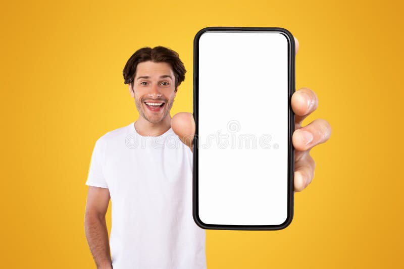 Man Showing White Empty Smartphone Screen Close To Camera Stock Photo ...