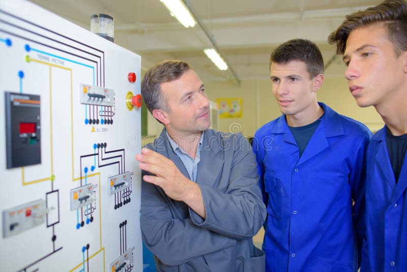 Man Showing Wiring Plan To Students Stock Photo - Image of diagram ...