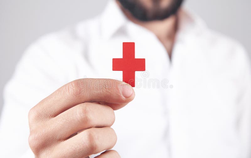 Man Showing Wooden Red Plus Symbol Stock Image - Image of social ...