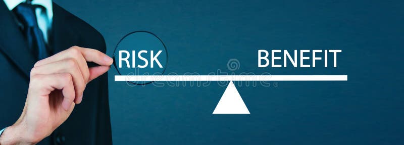 Man Showing Words Risk and Benefit in Balance Stock Photo - Image of ...
