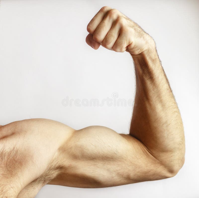 A man shows arm strength stock photo. Image of sign, caucasian - 86065076