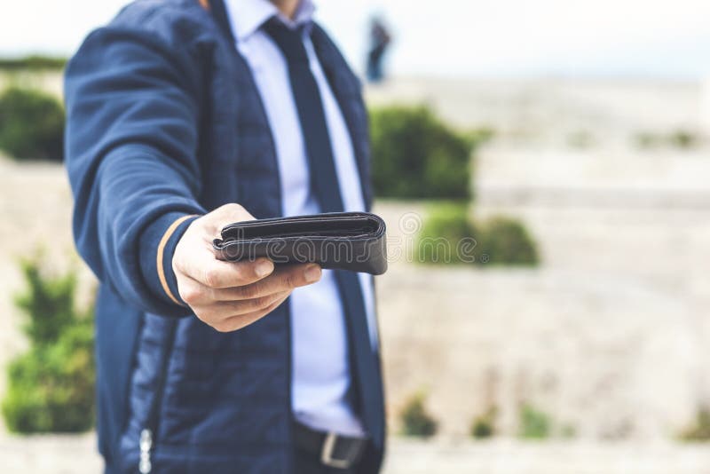 Man Shows an Empty Brown Wallet Stock Photo - Image of brown, leather ...