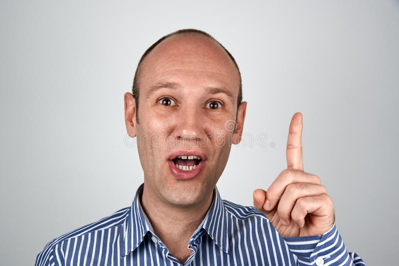 Man shows forefinger stock photo. Image of inspiration - 54346786