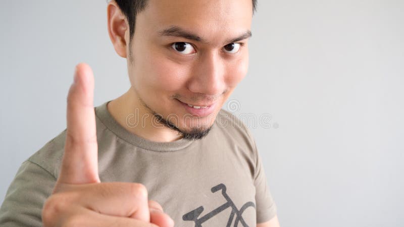 Man shows one finger. stock photo. Image of idea, modern - 71109596