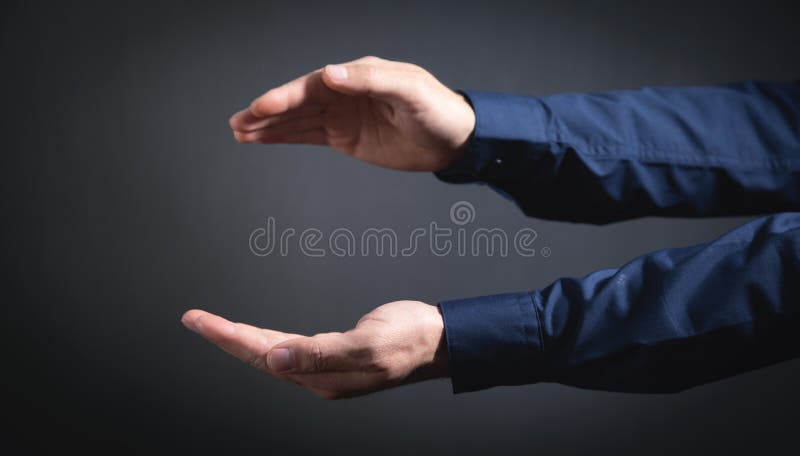 Man Shows a Protective Gesture with His Hands Stock Photo - Image of ...