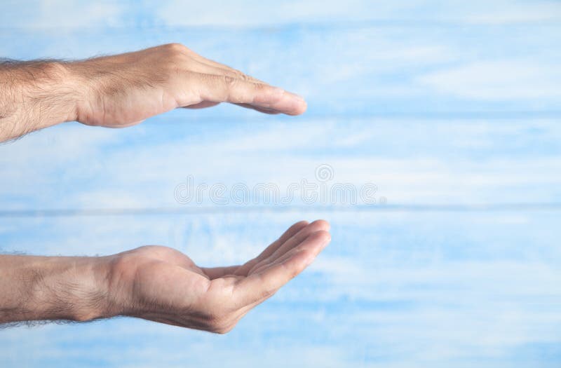 Man Shows a Protective Gesture with His Hands Stock Photo - Image of ...