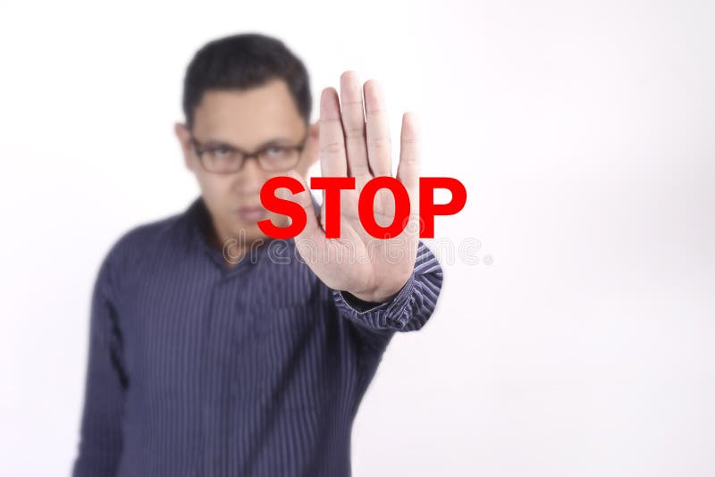 Man Shows Stop Gesture stock photo. Image of asian, expression - 147706188