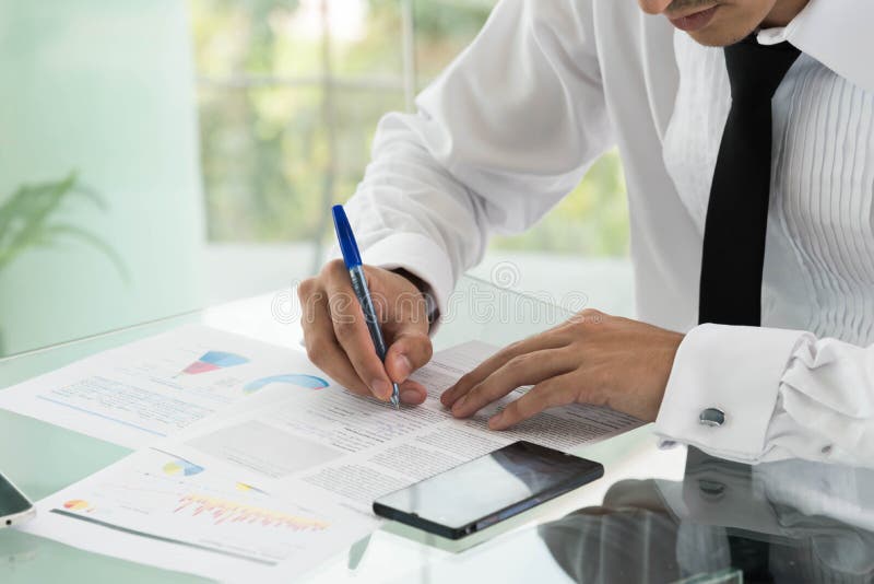 Man Sign on Paper, with Mobile Phone on Table Stock Image - Image of ...