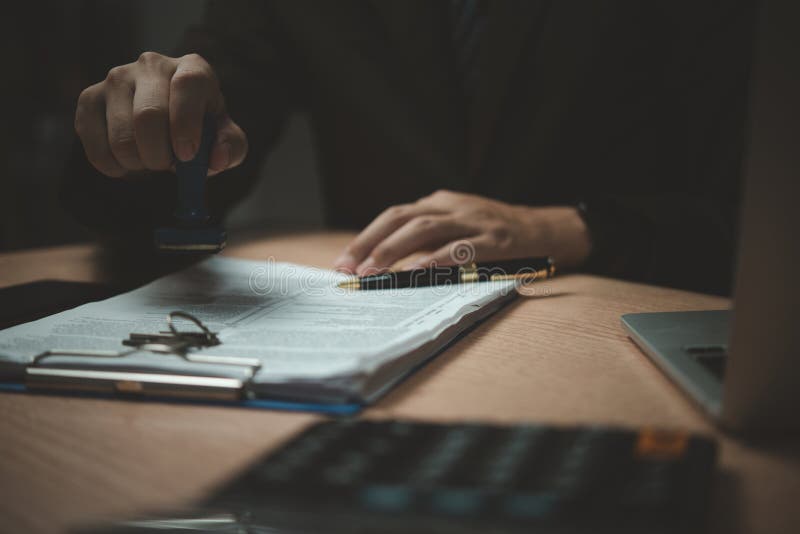 A Man is Signing a Document with a Stamp Stock Image - Image of deal ...