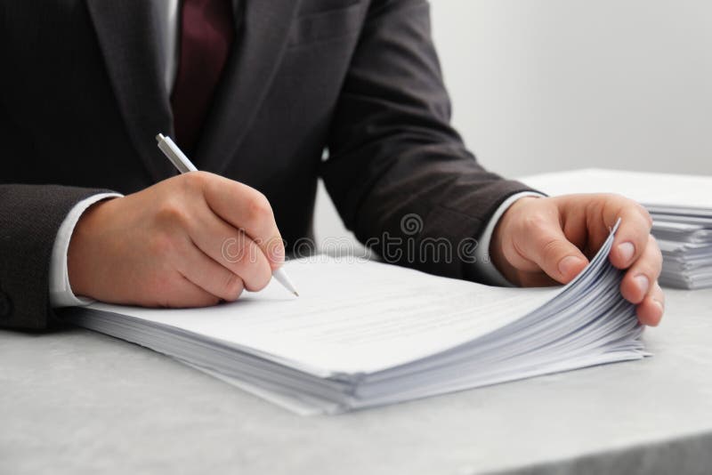 Man Signing Document at Table in Office, Closeup Stock Image - Image of ...
