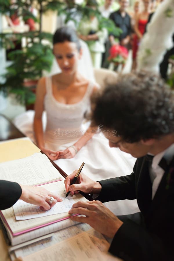 Man Signing Marriage Papers Stock Image - Image of newlywed, official ...