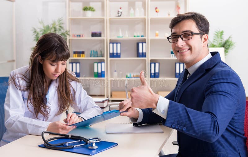 Man Signing Medical Insurance Contract Stock Photo - Image of client ...