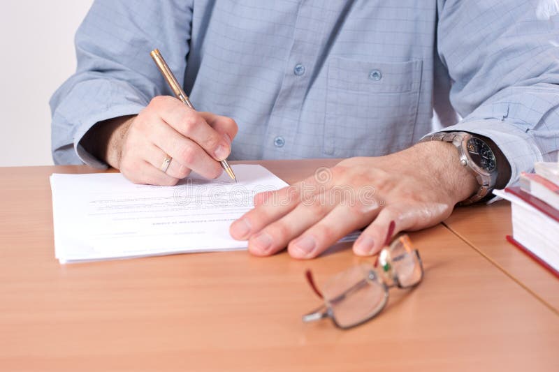 Man Signing Papers and Contracts on the Table Stock Photo - Image of ...