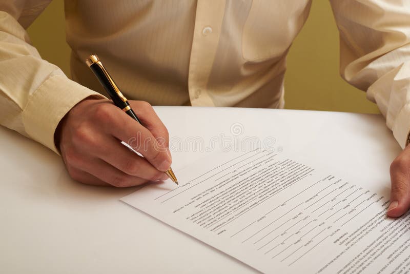 Man signs a contract stock photo. Image of table, cooperation - 76800122