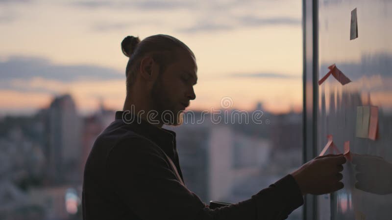 Man Silhouette Pondering Whiteboard in Sunset Hall Closeup. Developer ...