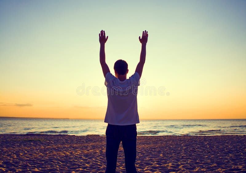 Man Silhouette with Hands Up Stock Photo - Image of orison, evening ...